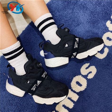 รองเท้าคลาสReebok Reebok ผู้ชายและผู้หญิงกีฬาพองรองเท้าลำลอง FV5565 ...