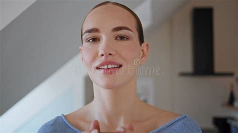 Portrait Woman Drinking Tea Cup Looking At Camera In Morning Sunlight