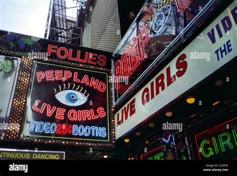 Adult Entertainment Neon Sign Display In Nd Street In New York City Taken Around Stock