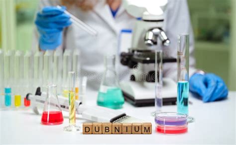 Conducting Laboratory Research Involving Various Chemicals And An Advanced Microscope Stock