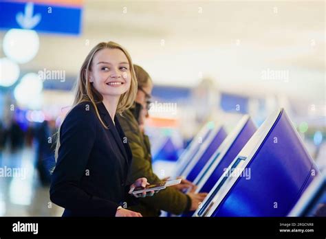 Young Elegant Business Woman Holding Passport And Boarding Pass Doing