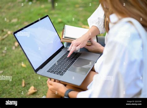 Close Up Female College Babe Using Portable Laptop Computer To Working Her Assignment With