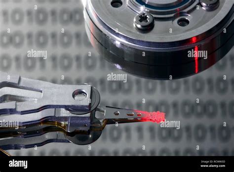 computer hard drive opened read write head on the disk binary