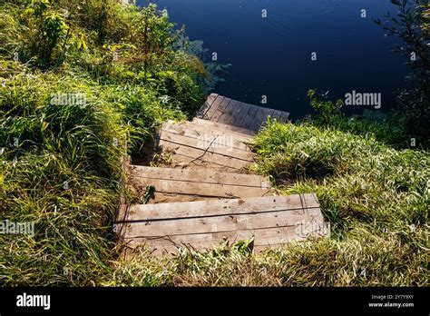 A Step By Step Descent To The Water On The Reservoir Equipped By