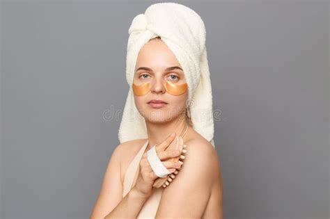 Beauty Portrait Of Attractive Calm Relaxed Young Woman Wrapped Head In