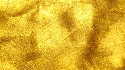Descargar Fondometálico Dorado Con Trazos Texturizados Wallpapers