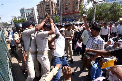 Security Personnel Detain Members Of Guest Assistant Professor