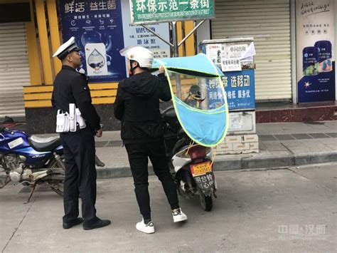 县公安局交警大队：专项整治摩托车、电动车非法加装遮阳伞乱象 汉阴县人民政府