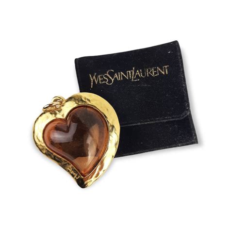 Ysl Yves Saint Laurent Gold Tone Heart Pendant With Amber Lucite Heart