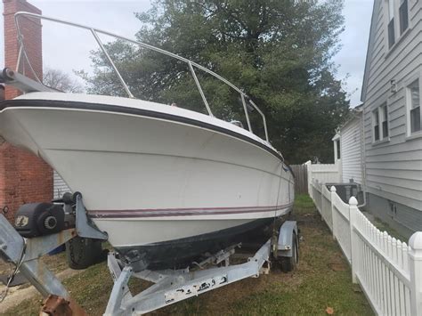 Wellcraft Runabout Boat Stern Has Trailer For Sale For Boats From USA