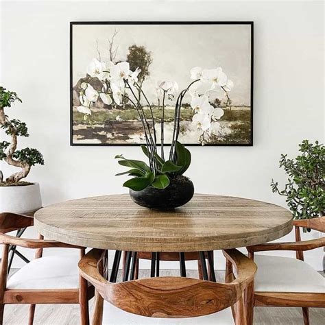Round Dining Table With Orchid Centerpiece Soul And Lane Round