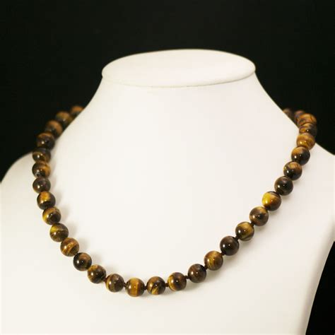 Collier oeil de tigre perle ronde mm Collier Oeil de tigre Miracles minéraux
