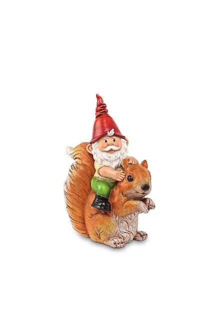 Premium Photo Gnome On A Squirrel Figurine