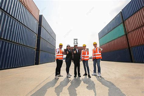 Supervisor Inspecting Container Loading At Harbor For Industry Logistics Photo Background And