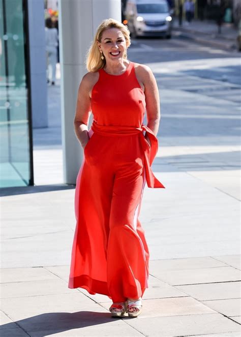 Claire Sweeney In A Belted Orange Jumpsuit Arrives At Vanessa Show 03