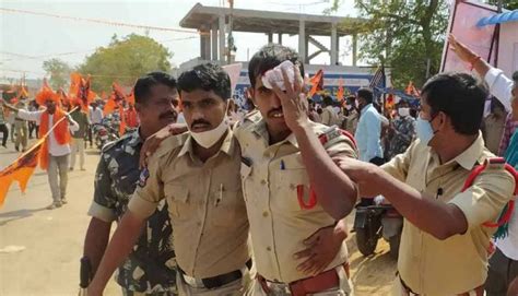 Police Officer Injured During Trs Bjp Workers Clash