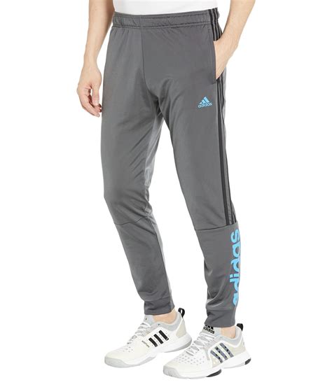 Adidas Essentials Tricot 3 Stripes Linear Track Pants In Gray For Men