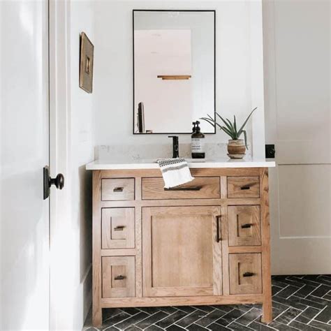 Light Wood Bathroom Vanity With Black Herringbone Floors Soul Lane