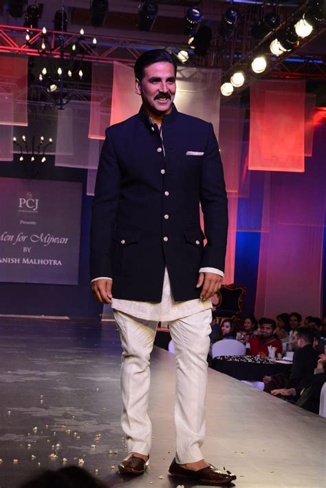 Actor Akshay Kumar Displays The Creations Of Fashion Designer Manish