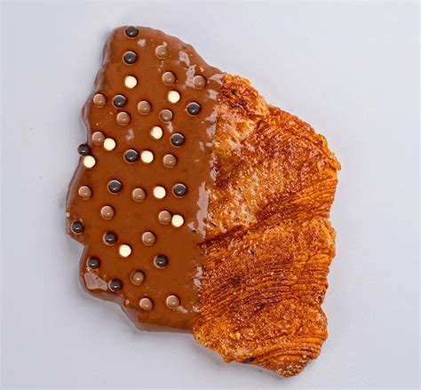 White Chocolate Flat Croissant With Chocolate Crisp Balls