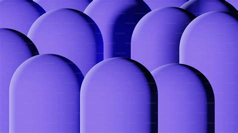 A Row Of Purple Oval Shaped Objects On A Purple Background Photo