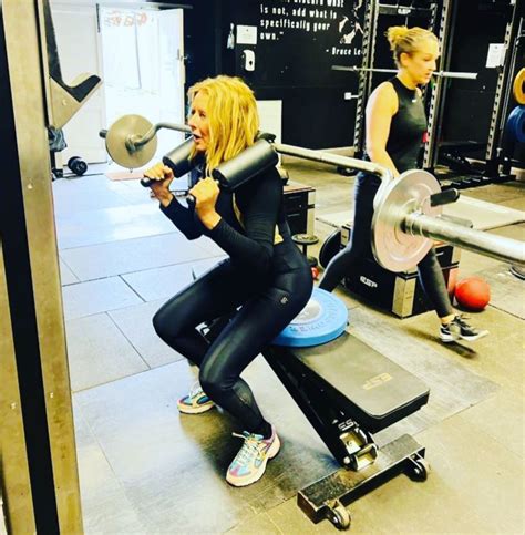 Carol Vorderman Shows Off Incredible Curves As She Works