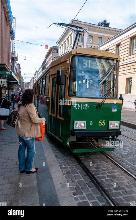 A Tram Arrives At A Tram Stop On Aleksanterinkatu In Helsinki Finland