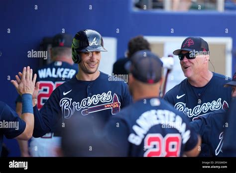 Atlanta Braves First Baseman Matt Olson Is Greeted In The Dugout After
