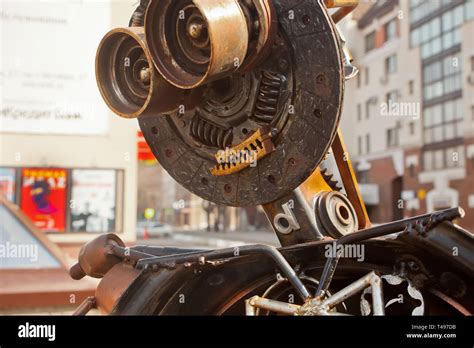 Metal Sculpture Of Trash Compactor Robot Made Of Rusty Details Of Old