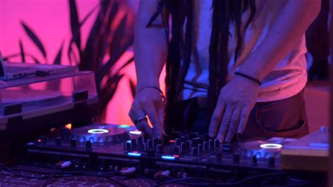 Premium Stock Video Dj With Dreadlocks Remixing Music Using Turntable