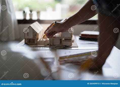 Architect Man Working With Blueprints For Architectural Plan Engineer