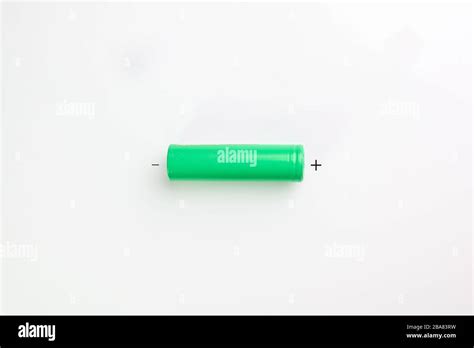 Single Green 18650 Small Hand Tool Battery With Positive And Negative Poles Identified On A