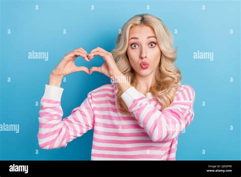 Photo Of Flirty Millennial Blond Hairdo Lady Show Heart Blow Kiss Wear