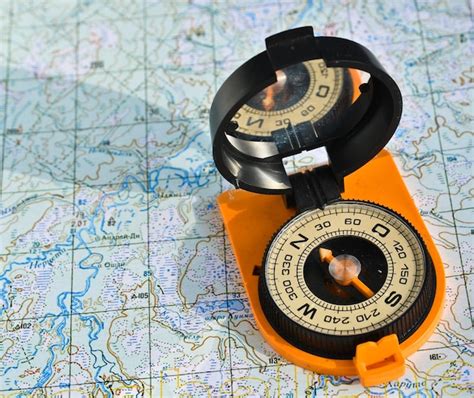 Premium Photo Compass On The Map