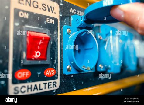 Blue Power Socket On The Body Of A Gasoline Electric Generator Close Up
