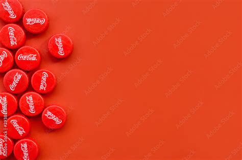 Many Red Caps With Coca Cola Logo On Red Background Stock Foto Adobe