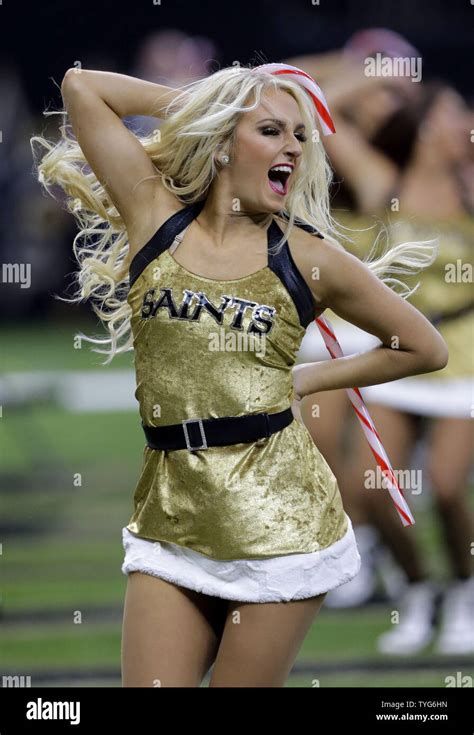 New Orleans Saints Cheerleader Entertains The Crowd During A Break In