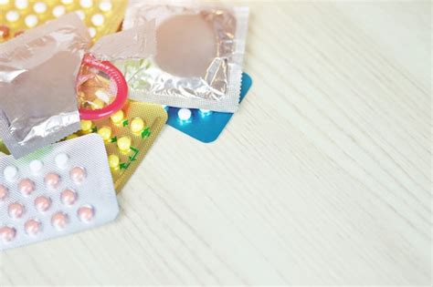 Premium Photo Birth Control Pills With Condoms