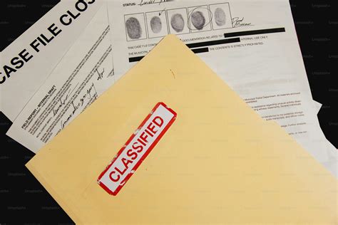 Case File Folder With Classified Documents And Photo Photo Documents