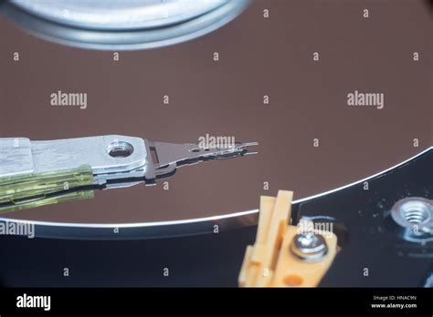 close up inside of computer disk drive hdd detail of writing and