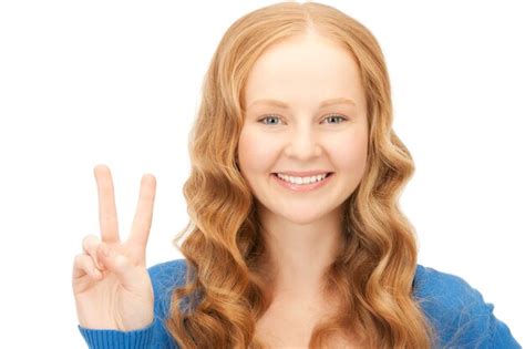 Premium Photo Bright Picture Of Lovely Woman Showing Victory Sign