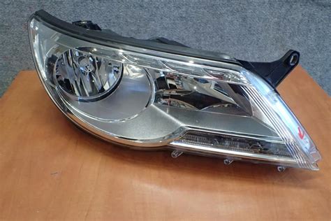 Lampa przód przednia prawa VW TIGUAN N oficjalne archiwum Allegro