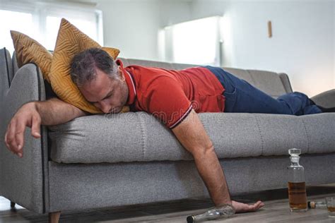 Drunk Man Sleeping On A Sofa Stock Image Image Of Despair Lifestyles