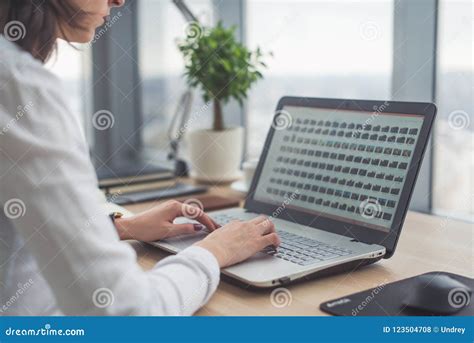 Businesswoman Typing On Laptop At Workplace Woman Working In Office