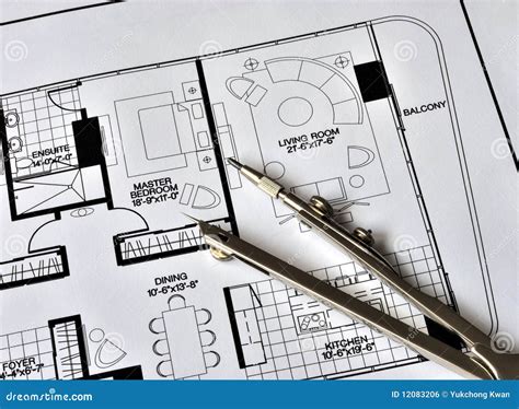 A Compass On The Top Of The Residence Floorplan Royalty Free Stock Image