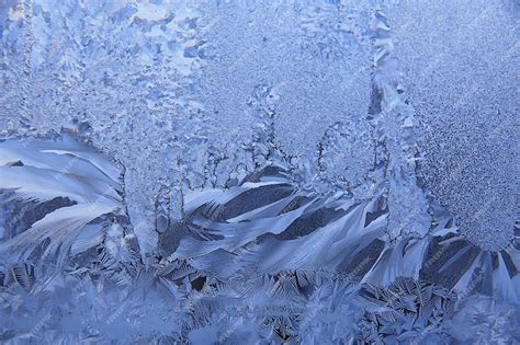 Premium Photo Frost Patterns On Window Glass Abstract Background