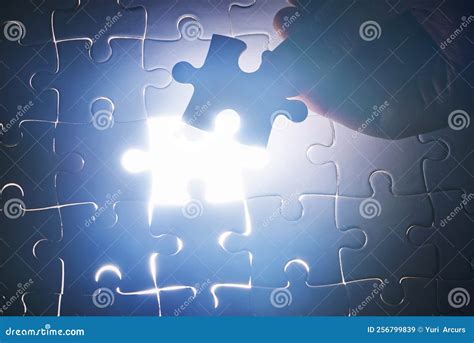 Completing The Puzzle A Puzzle Missing A Single Piece Stock Image
