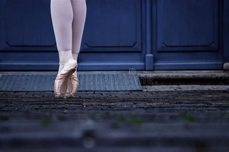 Closeup Of A Dancer Legs Balancing On The Pointe Shoes Ballerina