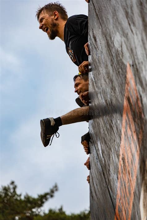 An Hard Extreme Obstacle Course Survival Race At Rainy Day Editorial