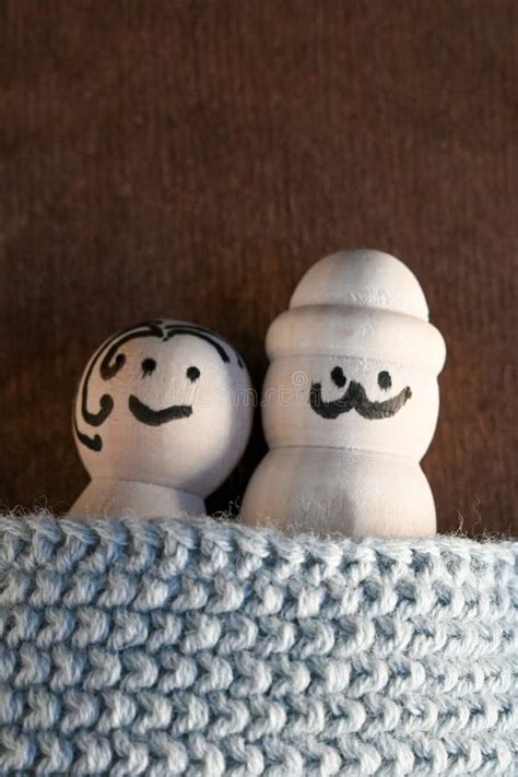 Wooden Peg Dolls Symbolizing Man And Woman Under A Duvet In Bed Stock Image Image Of